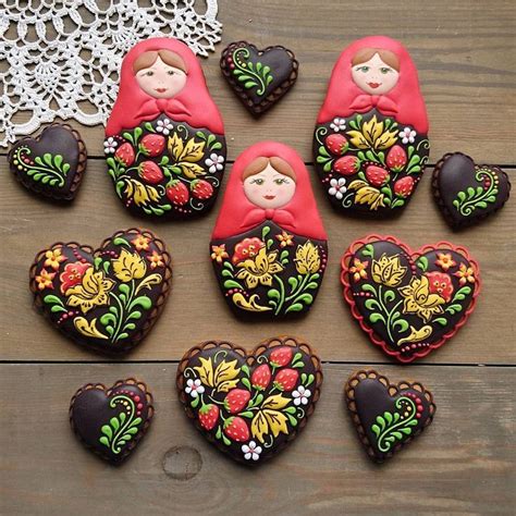 decorated cookies arranged in the shape of heart shaped figures with ...
