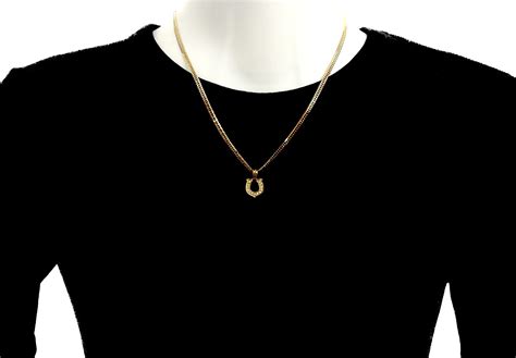 K18 ダイヤ入り馬蹄ペンダントトップ（小） 株式会社特撰すずき