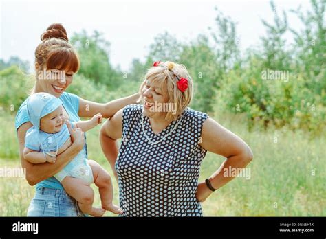 Grandmother With Her Grandson And His Mother Stock Photo Alamy
