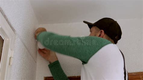 Worker Activating Programming Setting A Burglary Security System