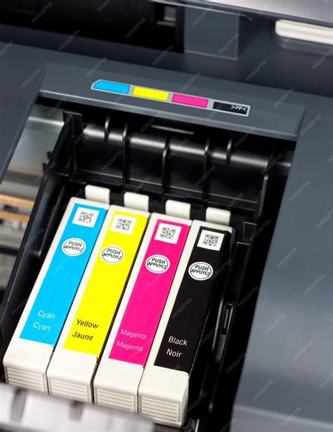 Premium Photo Closeup Of Printer Ink Cartridges For A Color Printer