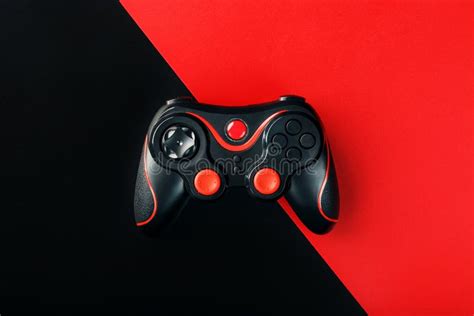Black Gamepad On A Black Red Background Gaming Concept Stock Image Image Of Joystick