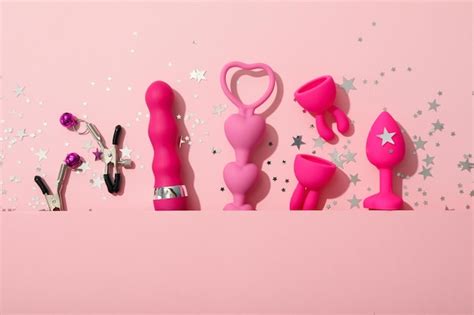 Premium Photo Sex Toy With Christmas Decor On A Pink Background