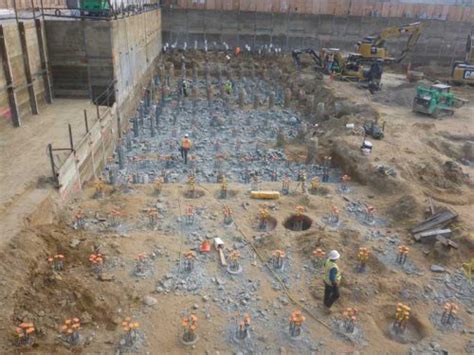 Photo 8 Auger Cast Piles For A Mat Foundation Chipped Down As Excavation Progresses