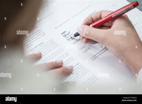 Woman Desk Signing Documents Close Up Hi Res Stock Photography And Images Alamy