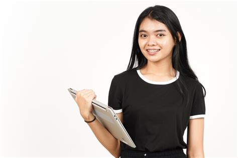 Premium Photo Smiling Looking At Camera And Holding Laptop Of