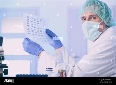 Scientist Analizing DNA Sequence In The Modern Laboratory Stock Photo Alamy