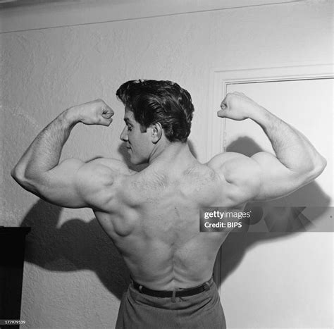 English Bodybuilder Reg Park Flexes His Biceps Circa 1955 Park Was