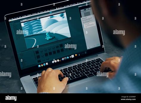 Game Developer Creating On Main Screen Of Unity Software On Apple Macbook Macos Operation System
