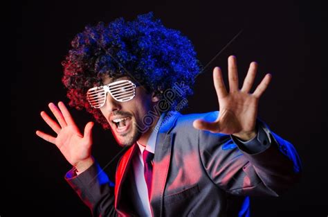 Singer With Afro Cut In Dark Studio Picture And Hd Photos Free