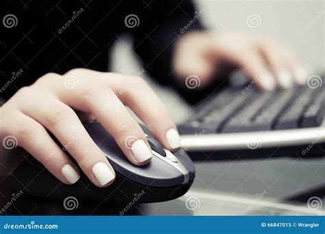 woman using computer mouse and keyboard stock image image of