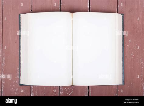 Science And Education Old Empty Open Book Top View On The Wooden Table Background Stock Photo