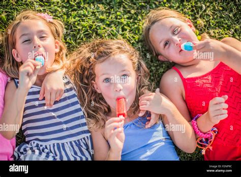 Girl Licking Popsicle Hi Res Stock Photography And Images Alamy