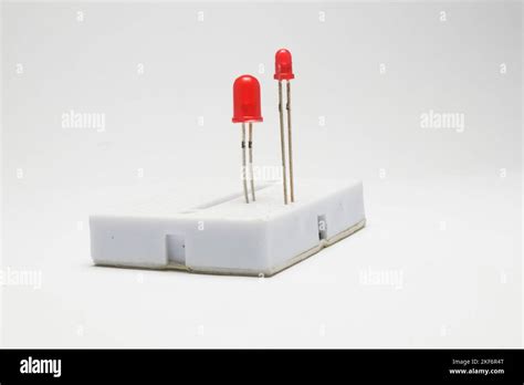 Two Leds Light Emitting Diodes Embedded In A Small Project Board Side View On A White