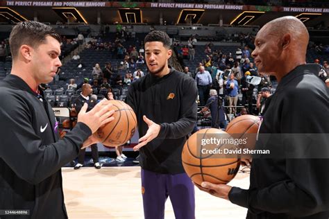 Devin Booker of the Phoenix Suns talks to NBA referee Andy Nagy... News Photo - Getty Images