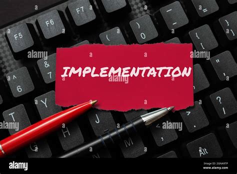 Handwriting Text Implementation Word Written On The Process Of Making Something Active Or