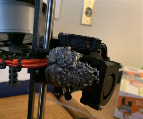 plastic stuck on print head assembly and first prints troubleshooting