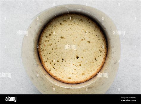 Overhead View Of Layered Cake Being Filled With Chocolate Ganache Top View Of Chocolate Filling Overhead View Of Layered Cake Being Filled With Chocolate Ganache Top View Of Chocolate Filling