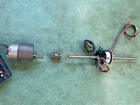need advice on designing drive train for small dc motor with slipring