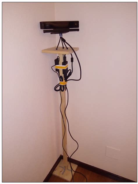 An Improved Indoor Positioning System Using RGB D Cameras And Wireless Networks For Use In