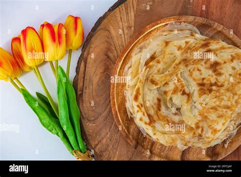 Malabar Parota In An Isolated Background South Indian Porata In A Wooden Plate And Decorated