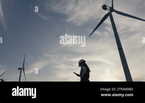 The Young Female Engineer Uses Her Skills And Knowledge To Optimize