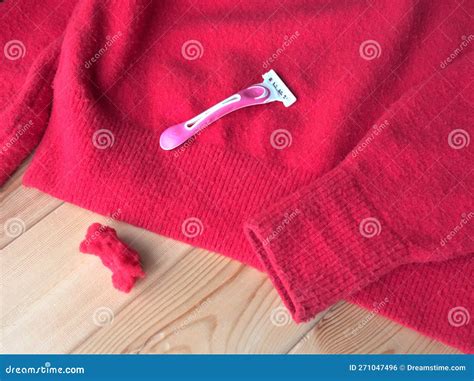 Lint Removal With A Safety Razor Stock Photo Image Of Instrument