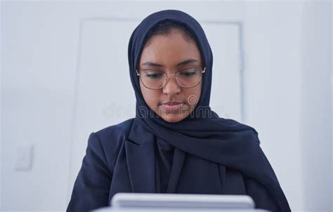 Muslim Tablet Working And Hijab Of A Serious Woman Employee From Dubai