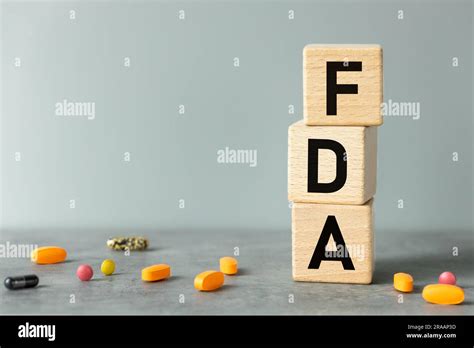 Fda Words On Wooden Blocks Beautiful Gray Background Business