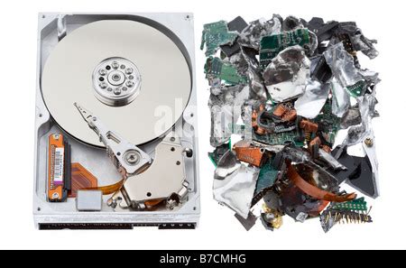 Parts Of Destroyed Computer Hard Disk Drive HDD Exploded View HDD Destroy USA Stock Photo