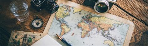 Travel Essentials Camera Map Notebook And Compass Ready For Your