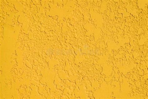Close Up The Texture Of The Facade Of Decorative Yellow Plaster Stock