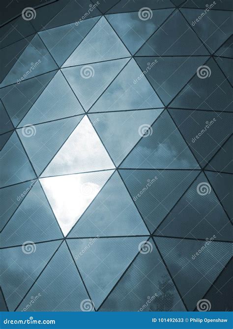 Modern Glass Triangular Cladding Windows With Sky And Clouds Ref Stock