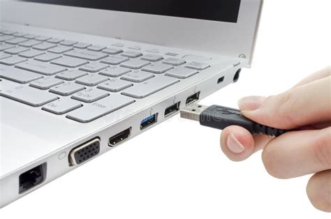 A White Usb Type C Usb C Cable Being Plugged Into A Modern Notebook Laptop Computer Stock
