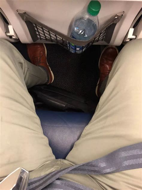Woman Shames Big Bloke For Manspreading On Plane As People Dub Him