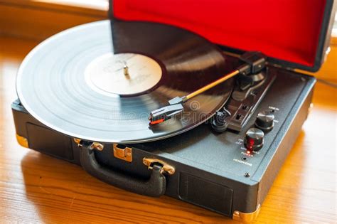 Vintage Suitcase Style Record Player Spinning Vinyl Record Retro Music