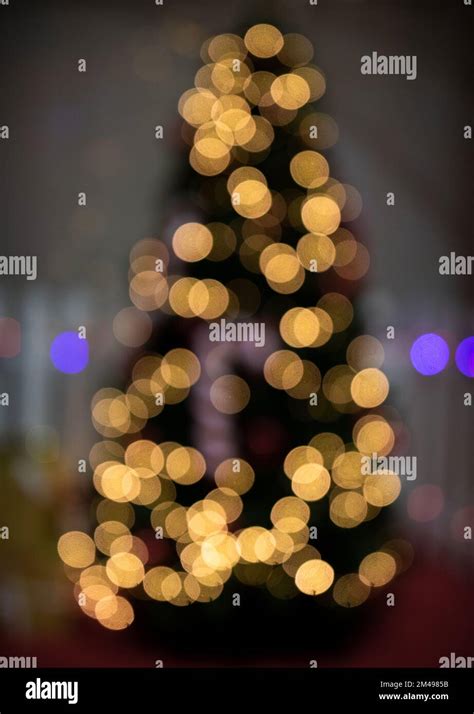 Defocused Christmas Tree With Bokeh Fairy Lights Glowing Abstract Blur Defocused Christmas Tree With Bokeh Fairy Lights Glowing Abstract Blur