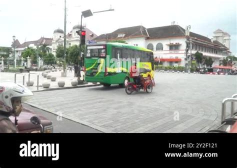 The Trans Jogja Bus Pass At The 0 Km Point Of Yogyakarta The