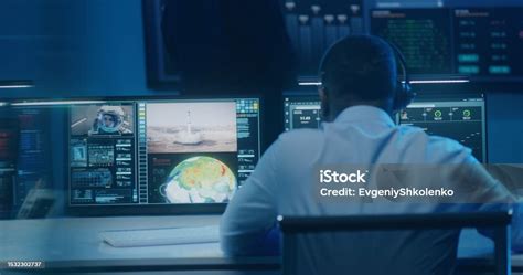 Employee Monitors Space Mission Claps Hands After Space Rocket Launch