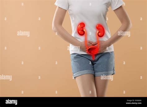 Woman Suffering From Cystitis On Beige Background Closeup