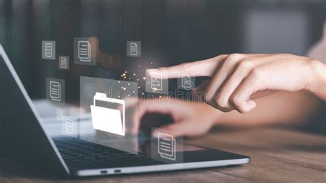 Businessman Using Laptop To Access Documents Onlinedocument Management
