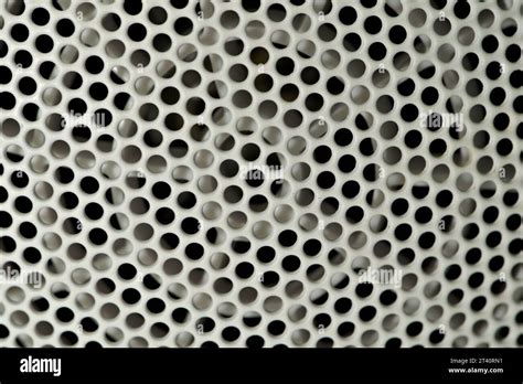 Geometric Pattern Of Holes On The Metal Grate Abstract Detail Photography Of Perforation On