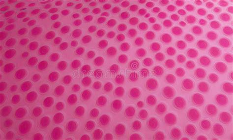 Close Up View Pink Fabric With Repeating Pattern Small Circles Creating Textured And Visually