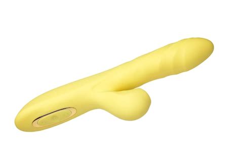Premium Photo Sex Toy Yellow Vibrator For Clitoris On White Background