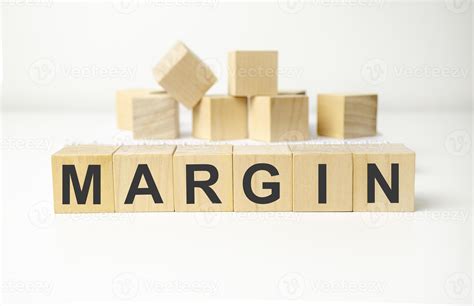 Margin Word Made With Wooden Blocks And White Background Stock Photo At Vecteezy