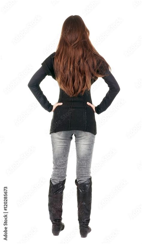 Back View Of Standing Young Beautiful Woman Blonde Girl In Jeans And