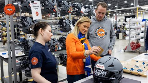 Peyton Manning Carrie Penner Check In On High School Helmet Project