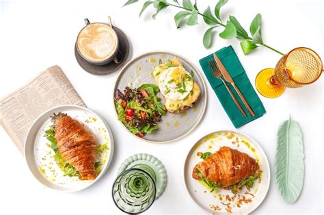 Premium Photo An Exquisite Set Of Breakfast Dishes Croissants Toast