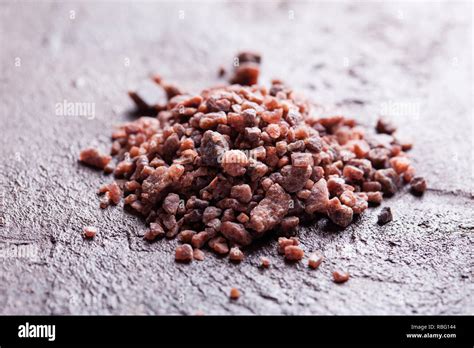 Black Salt S A Type Of Rock Salt On Slate Background Stock Photo Alamy