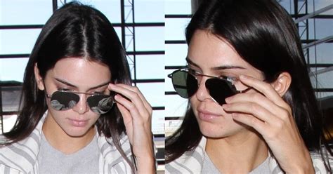 Kendall Jenner S White Sneakers And Striped Silk Wool Duster Coat